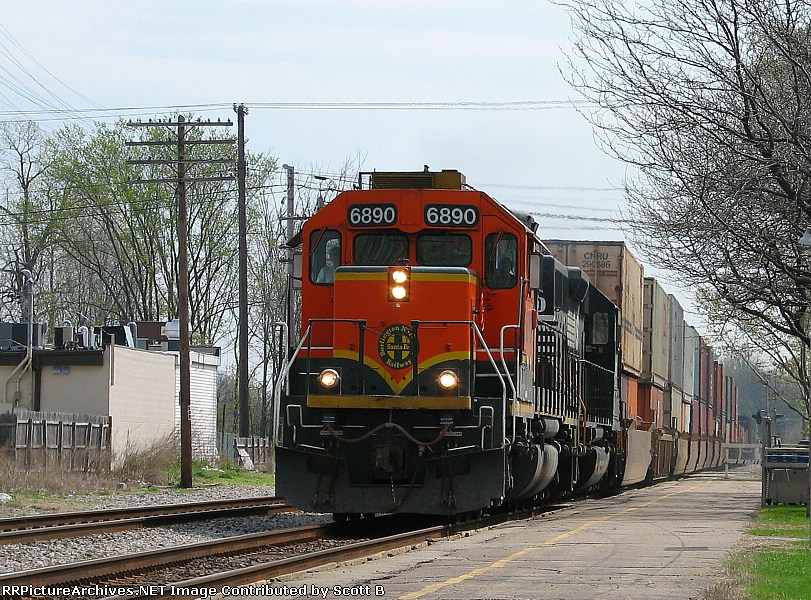 BNSF 6890 A Wastbound CN train at the AMTK station